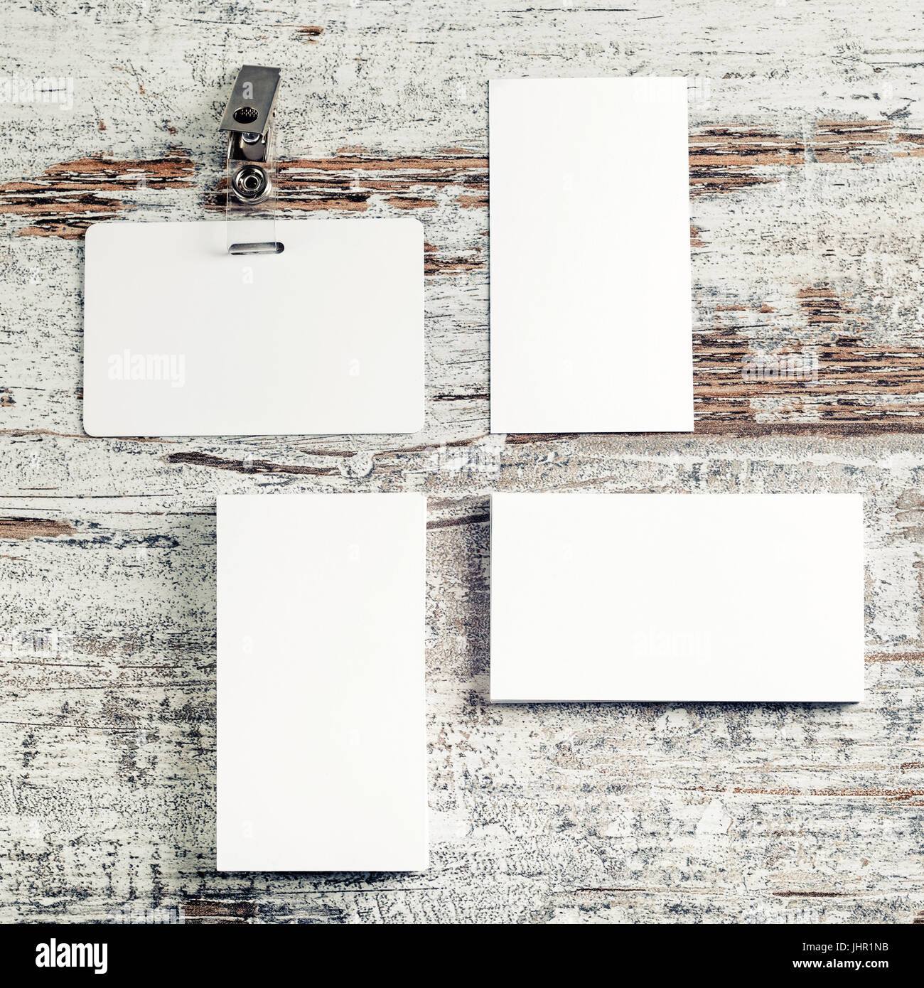 Bank badge and business cards on wood table background. Mock up for ...