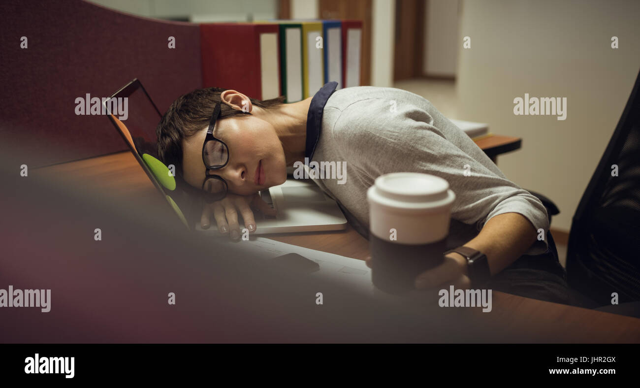 Tired at office desk workload hi-res stock photography and images - Alamy
