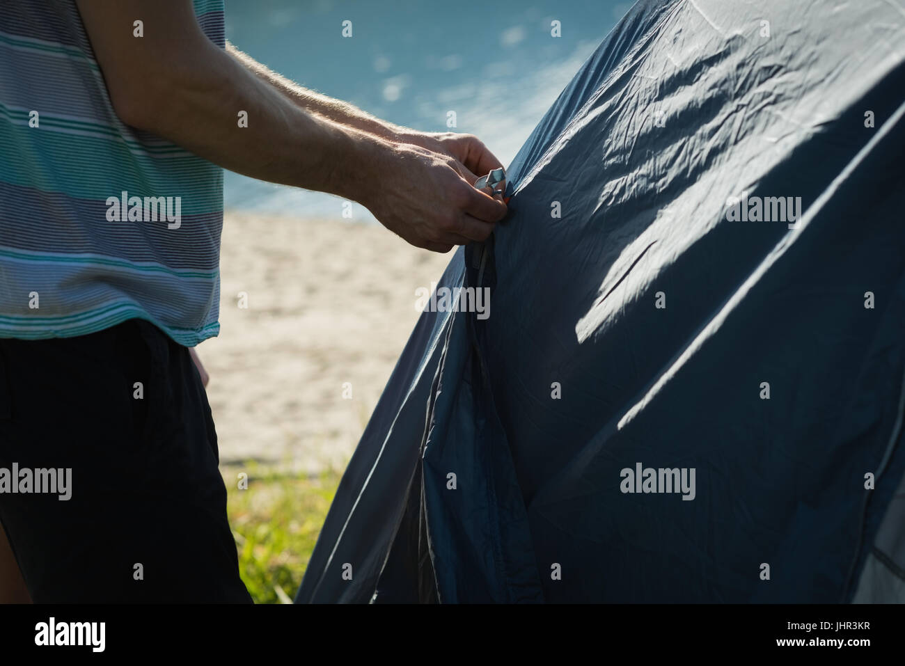 Man putting up hi-res stock photography and images - Alamy