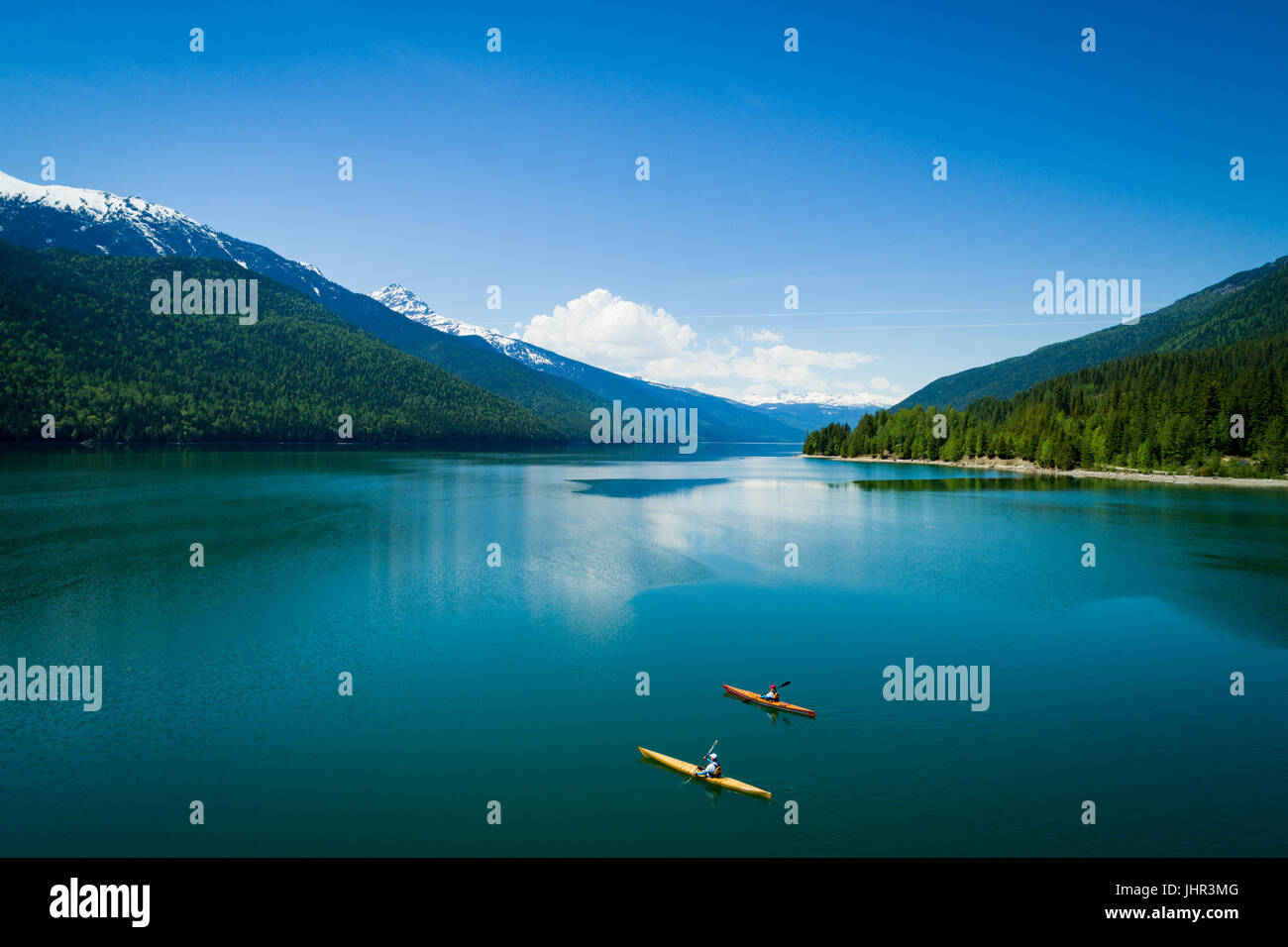 High angle view of couple enjoying watersport Stock Photo - Alamy