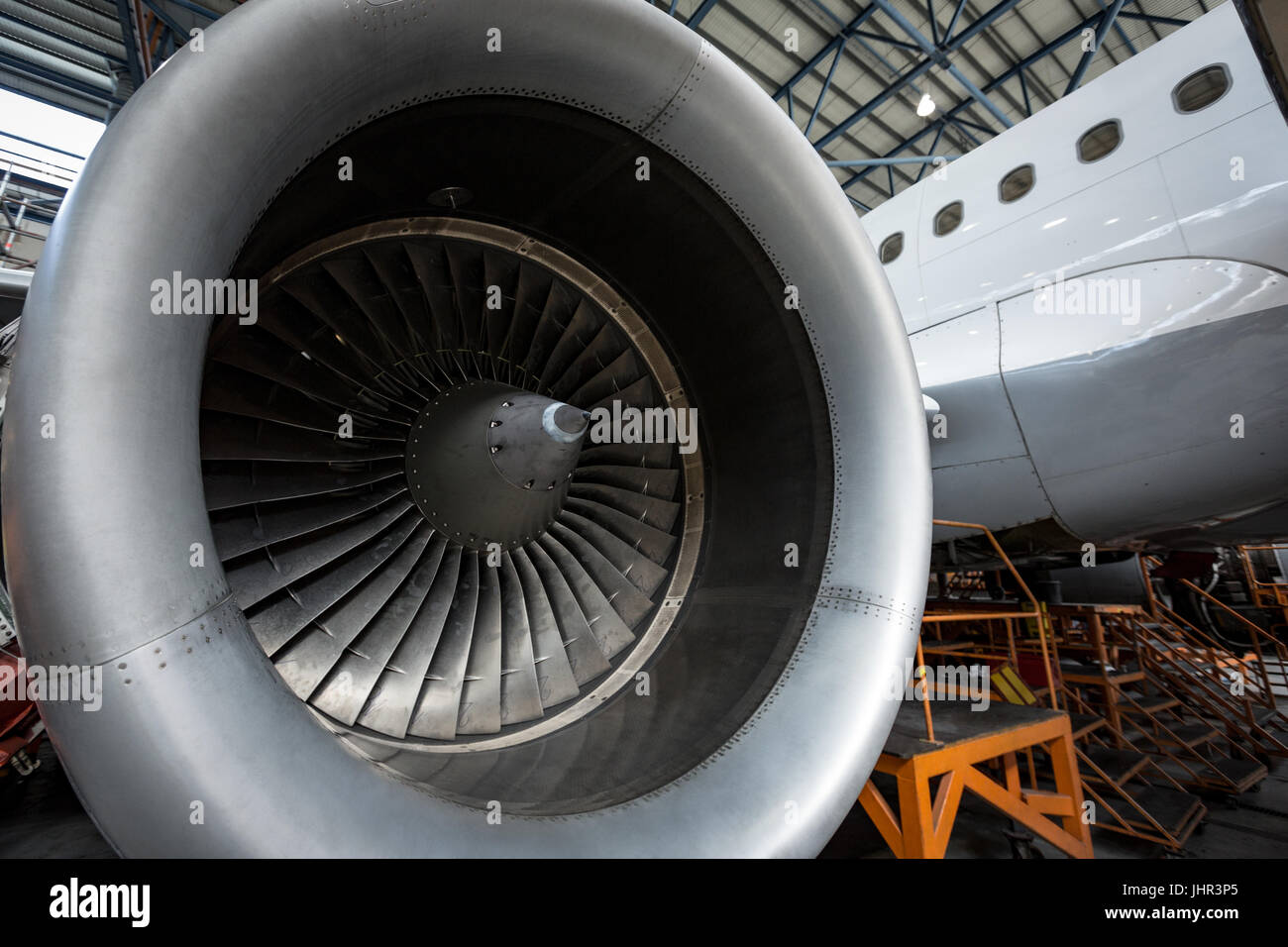Close-up of turbine engine of an aircraft at airlines maintenance ...
