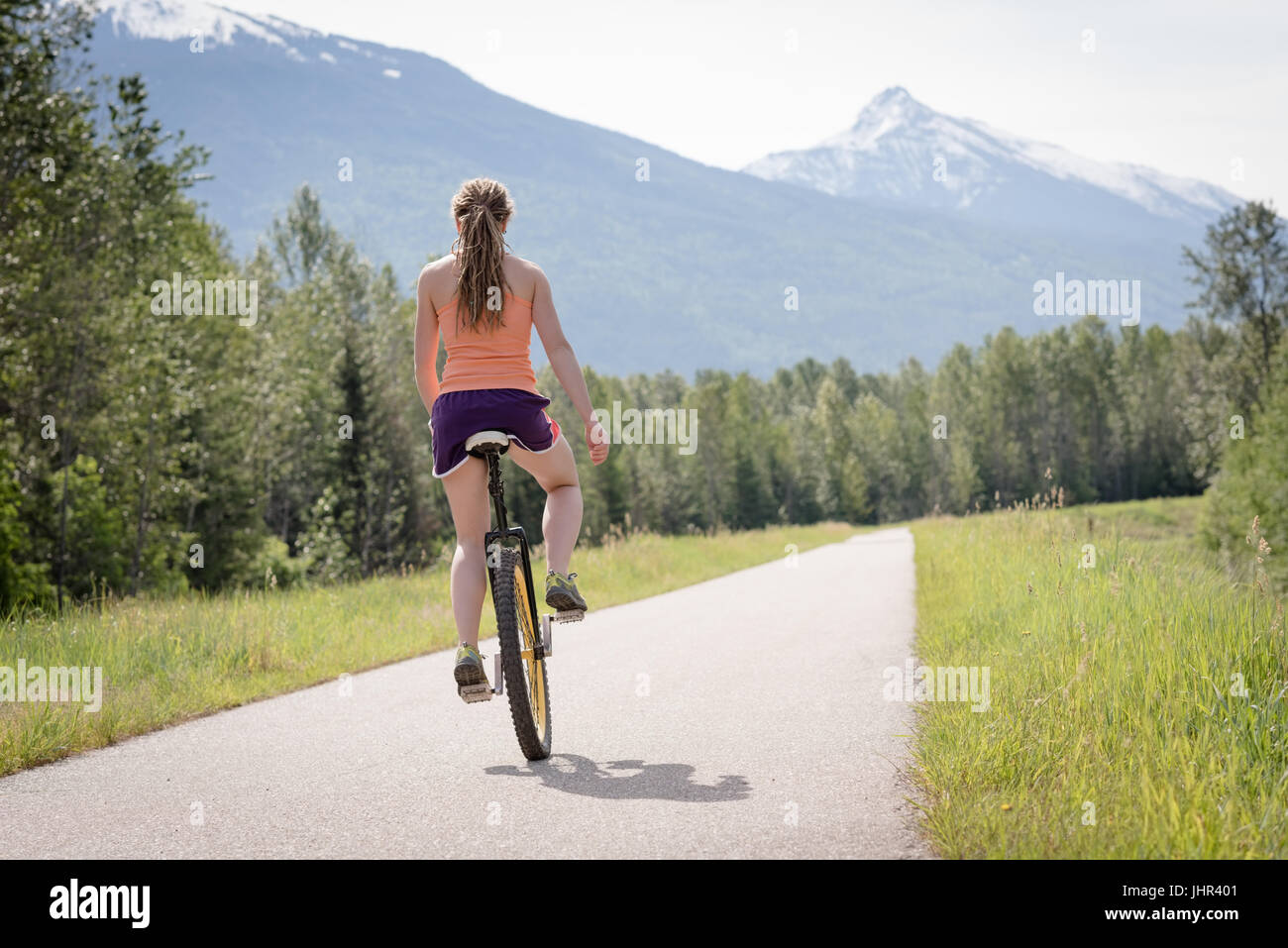 Unicycling hi-res stock photography and images - Alamy