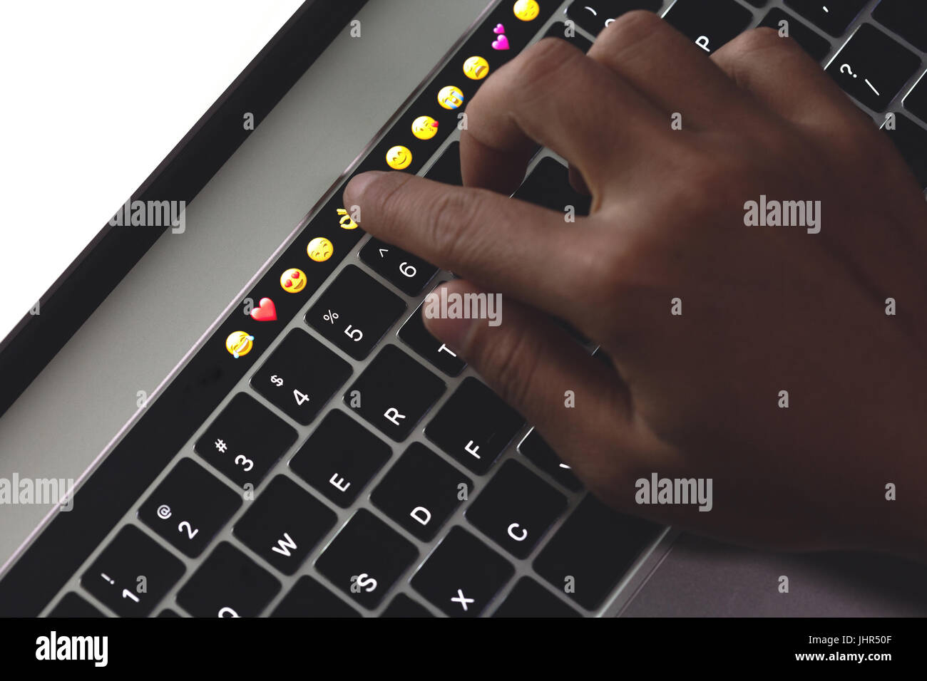 close-up hand touching on laptop computer Stock Photo - Alamy