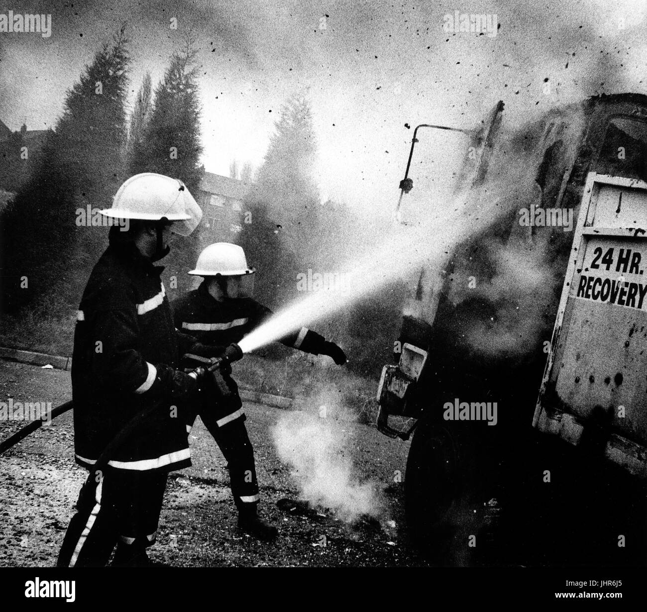 Fire fighters of West Midlands fire brigade put out a vehicle fire in ...