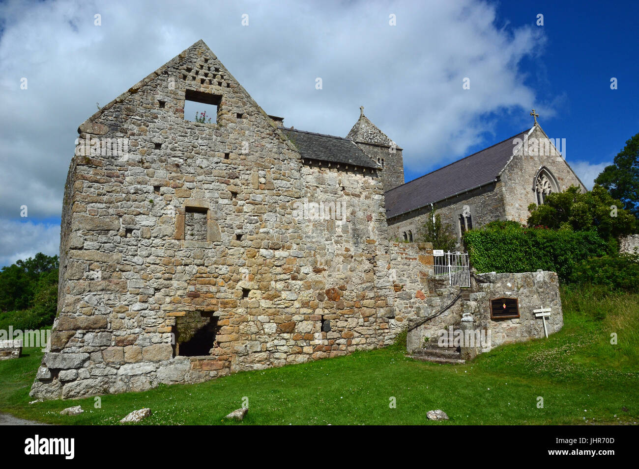 Penmon Priory with St Seiriol's Priory Church in the background, at ...