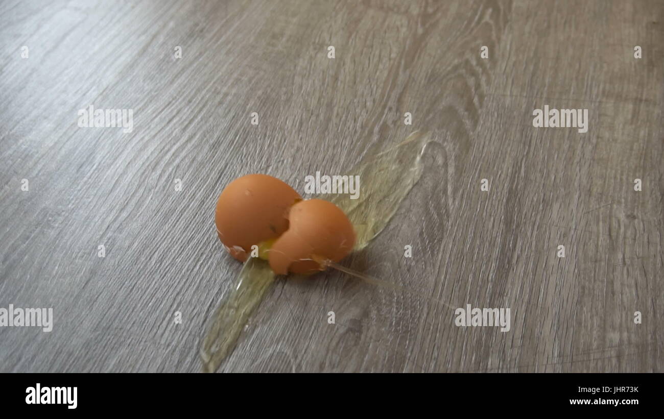 Breaking egg floor hi-res stock photography and images - Alamy