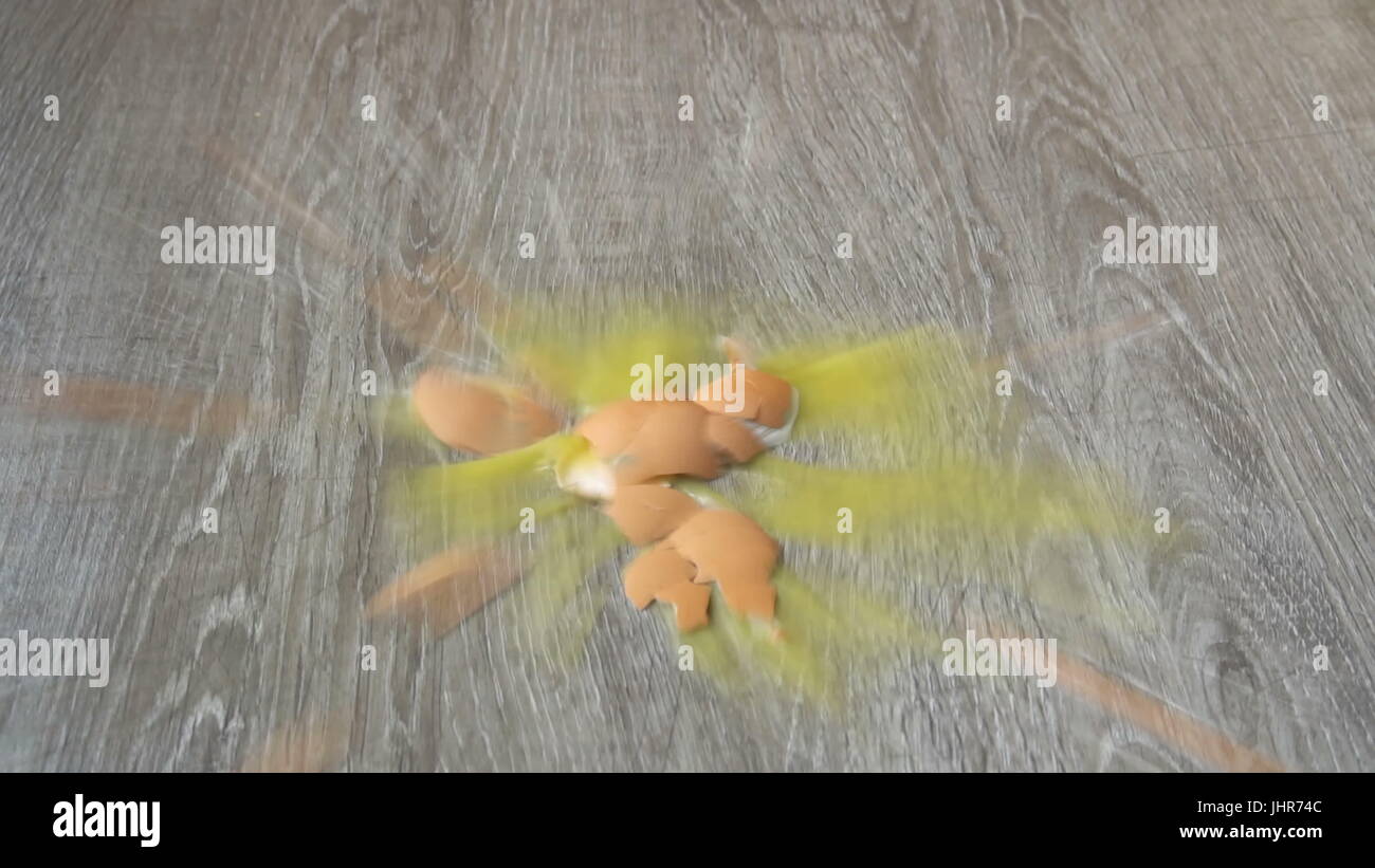 Breaking egg floor hi-res stock photography and images - Alamy