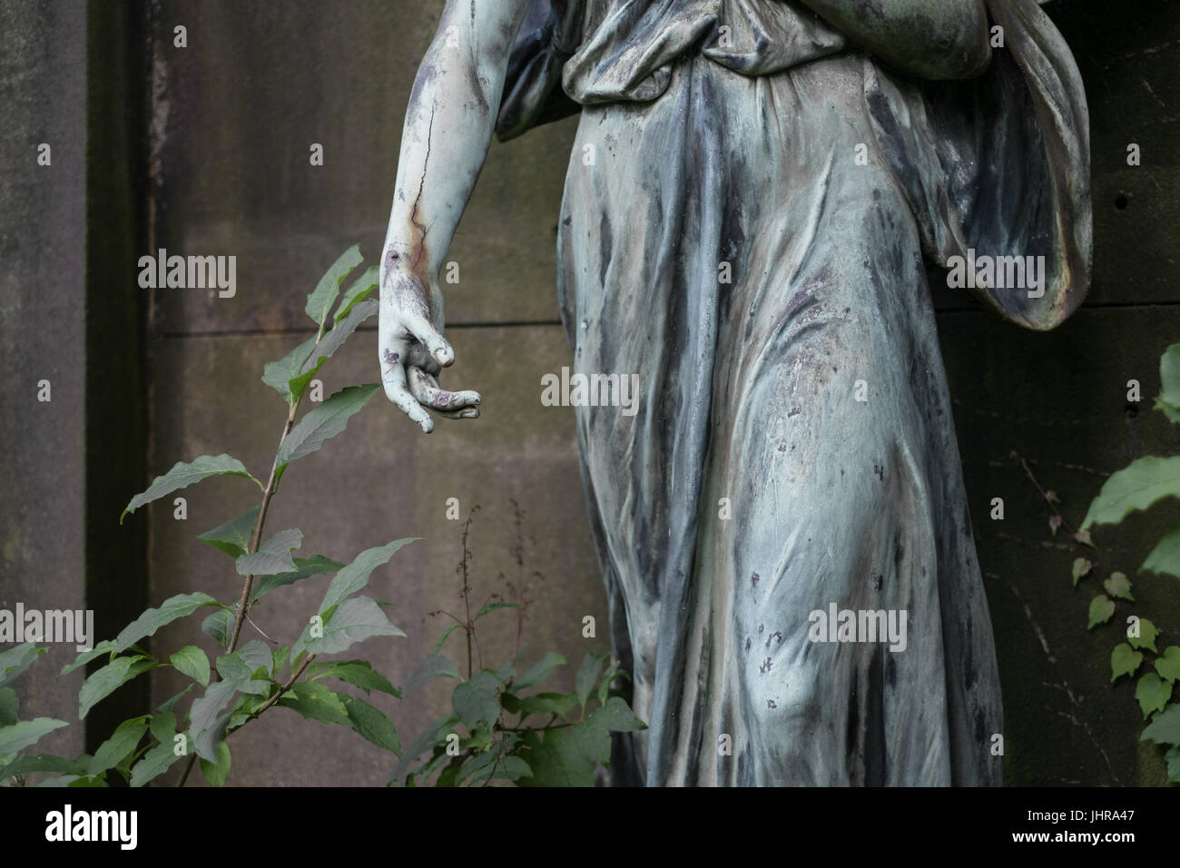 hand of a female statue on cemetery Stock Photo - Alamy
