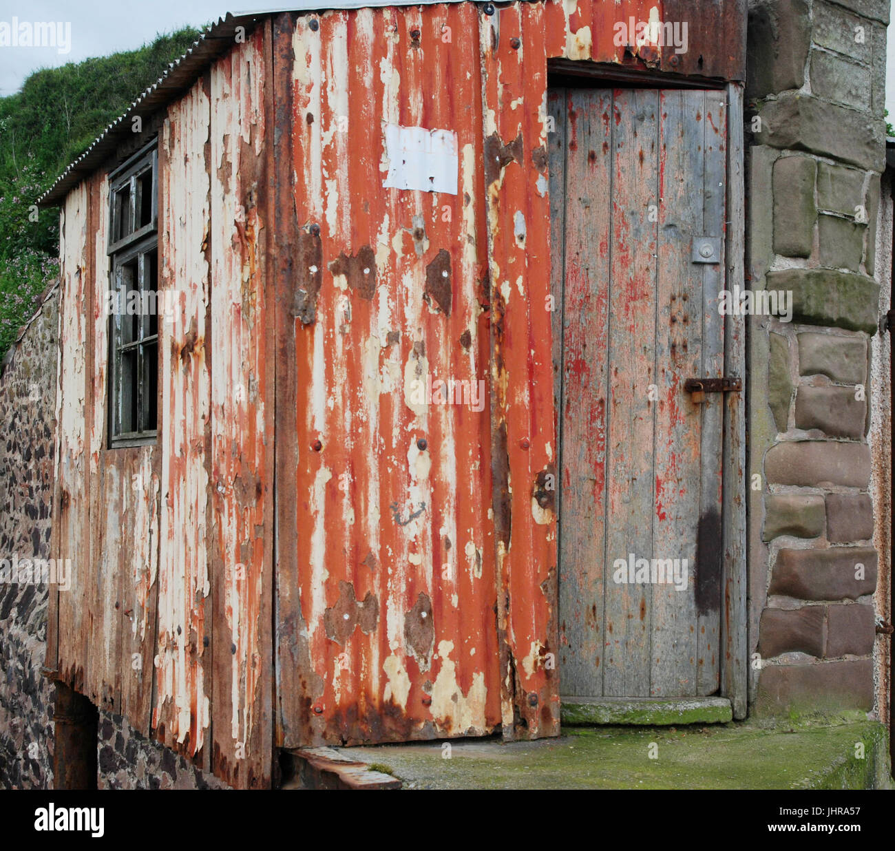 rusty old tin fisherman's hut at St. Abbs harbour Stock Photo - Alamy