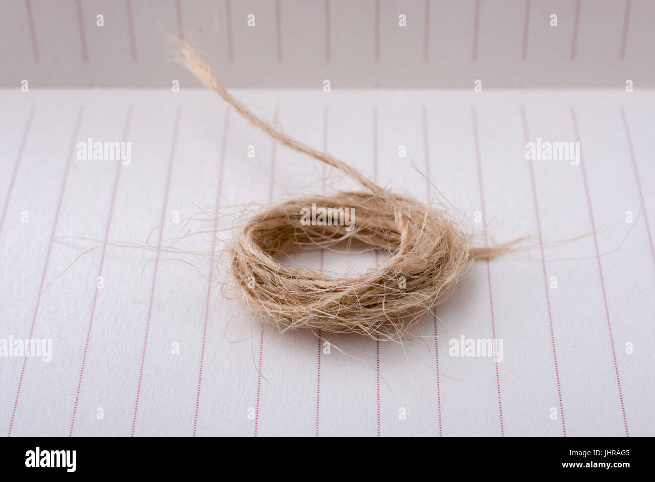 Roll of brown color linen string paper background Stock Photo - Alamy