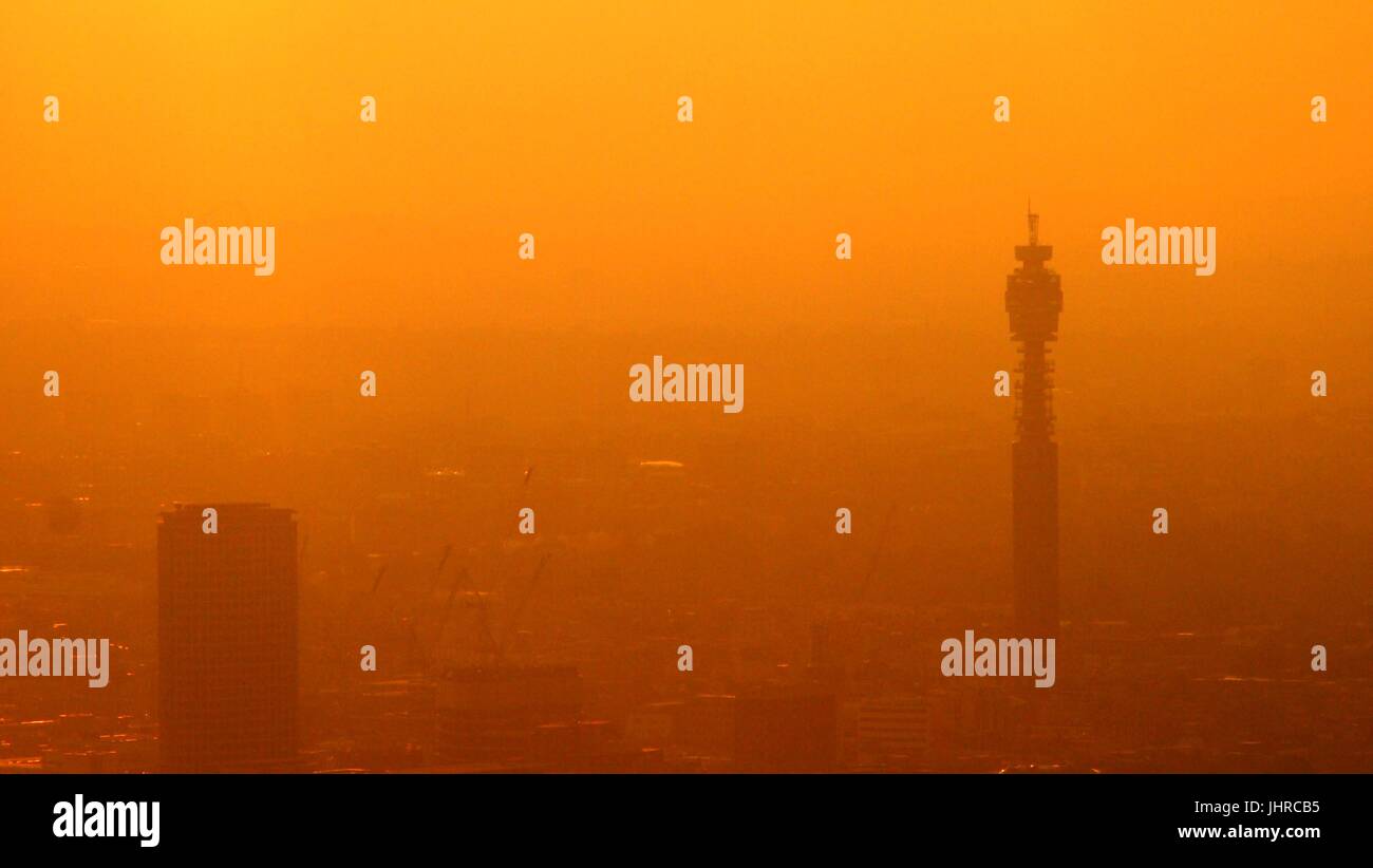 Smog covers London skyline at sunset Stock Photo - Alamy