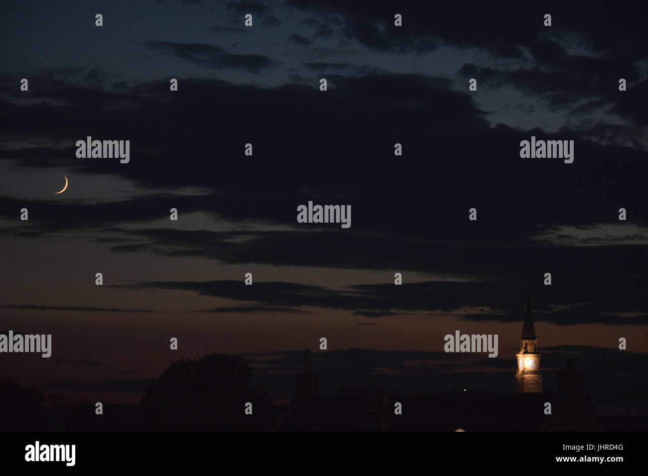 Church clock at night Stock Photo - Alamy