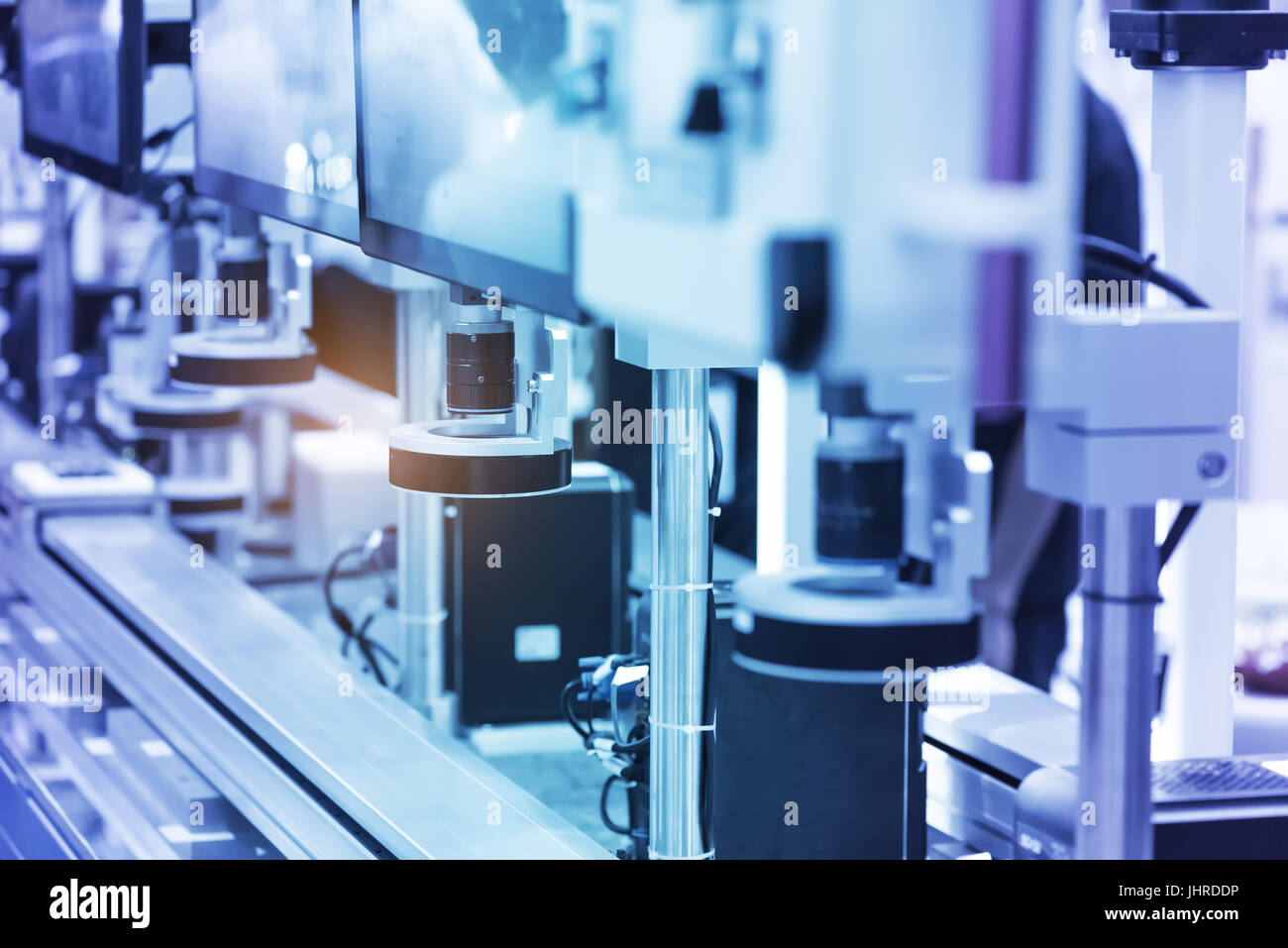 Robotic machine vision system in phone factory Stock Photo - Alamy