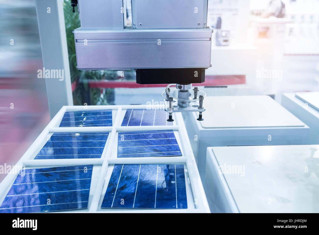 production of solar panels, Industrial robot working in factory ...