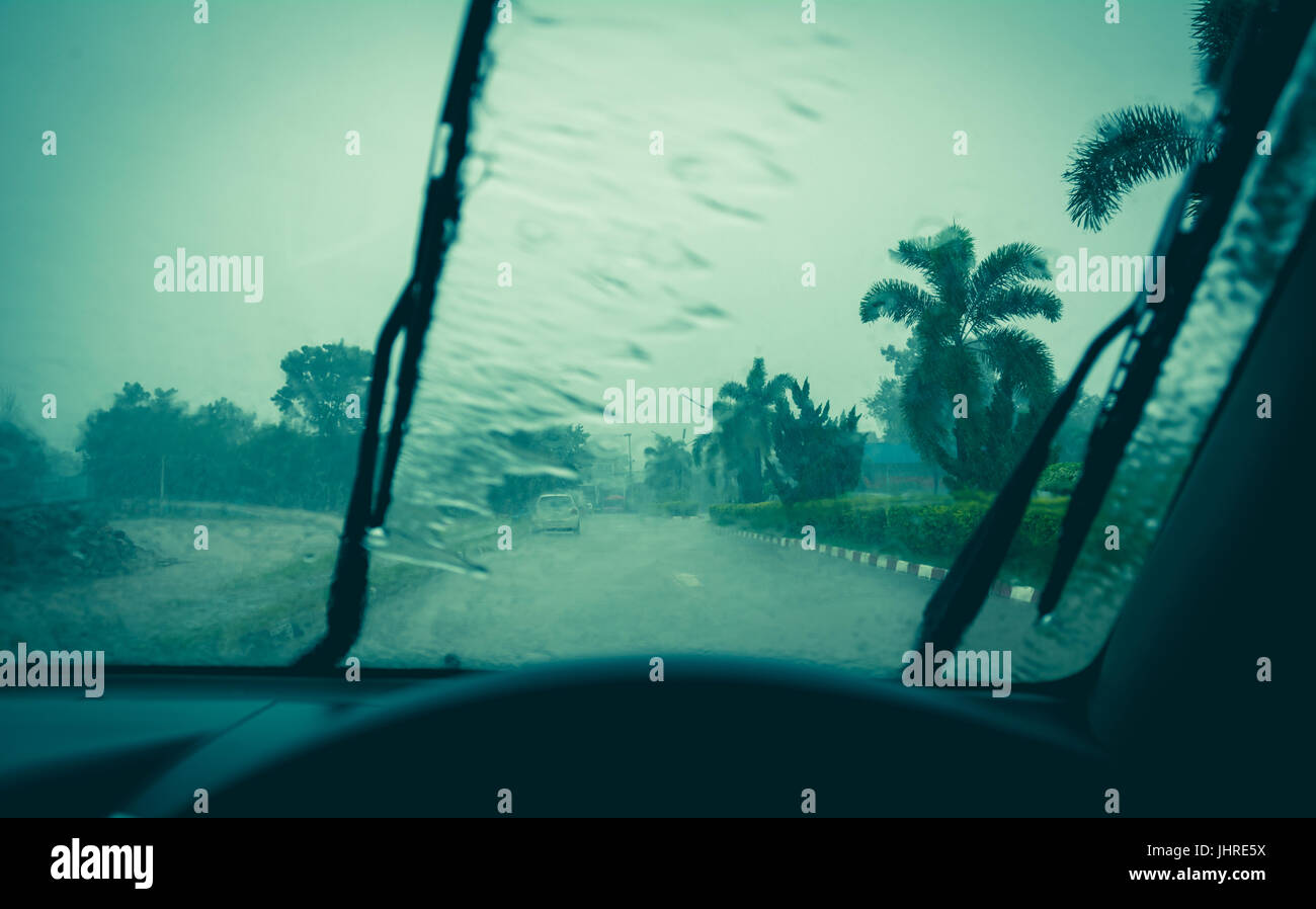 Water drop on glass mirror. Wiper on a wet windshield nature background ...