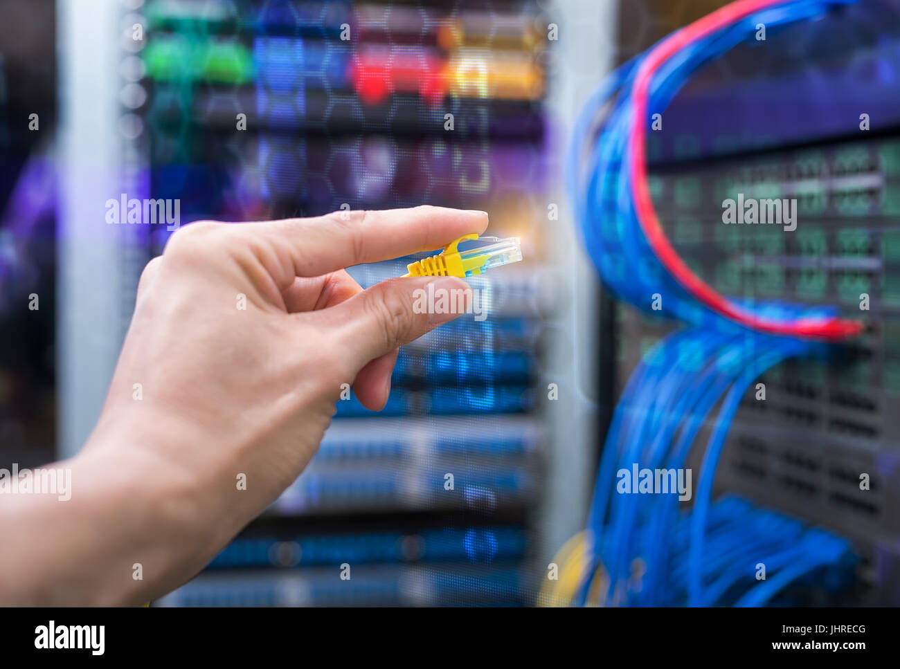 Hand plugs ethernet cable router hi-res stock photography and images ...