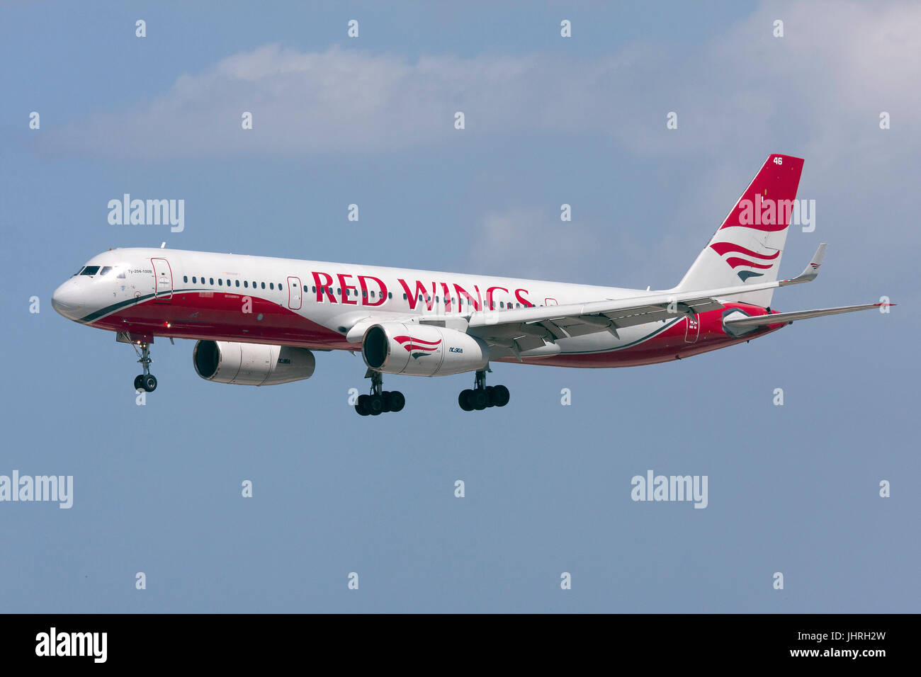 Red Wings Tupolev Tu-204-100V landing runway 31 Stock Photo - Alamy