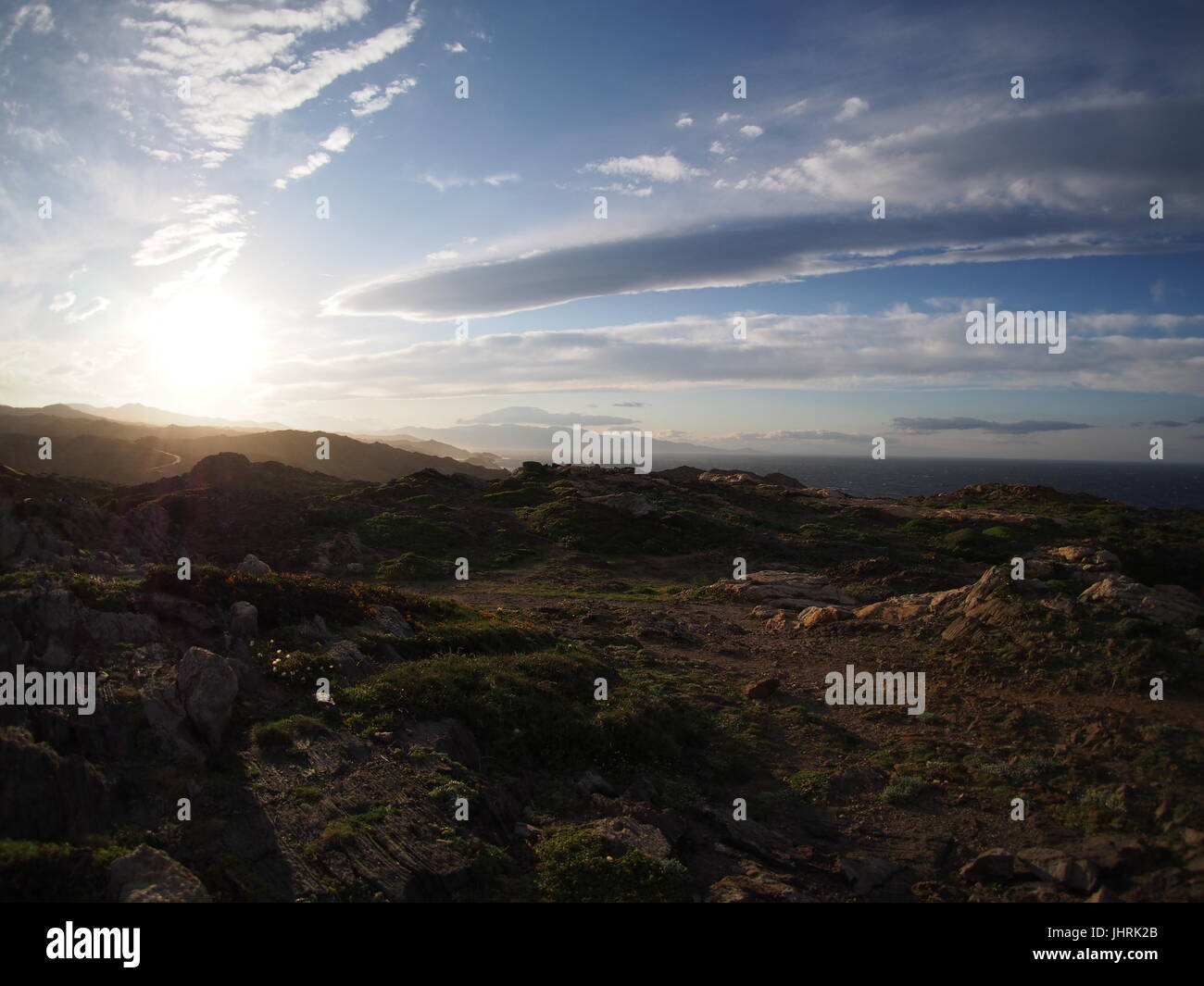 Sun setting over Spanish hills Stock Photo - Alamy