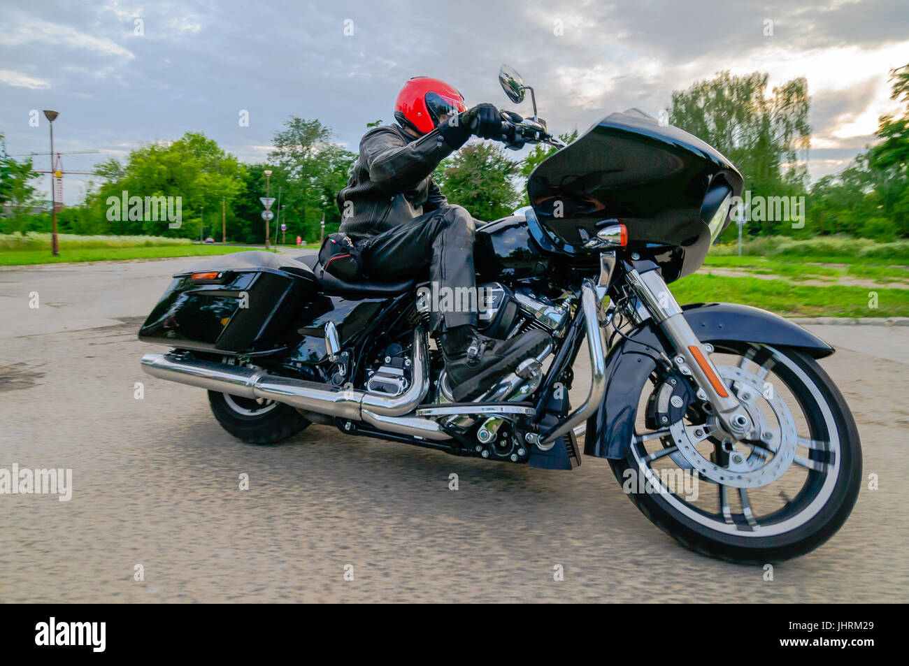 Black Custom Motorbike and the rider Stock Photo - Alamy