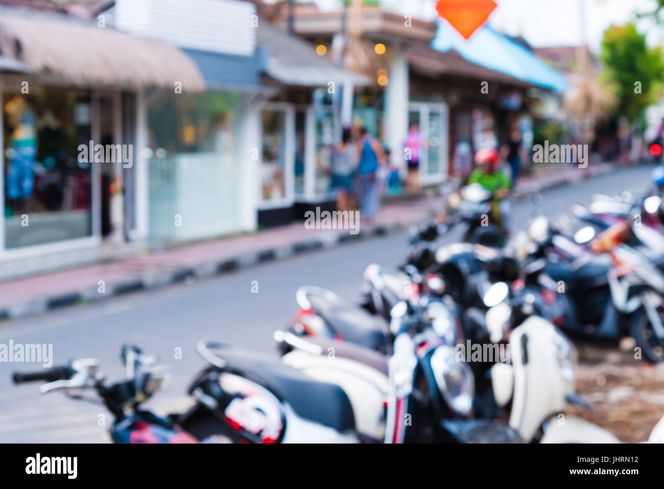 Blurred street view and motorcycles in Bali, Indonesia as background ...