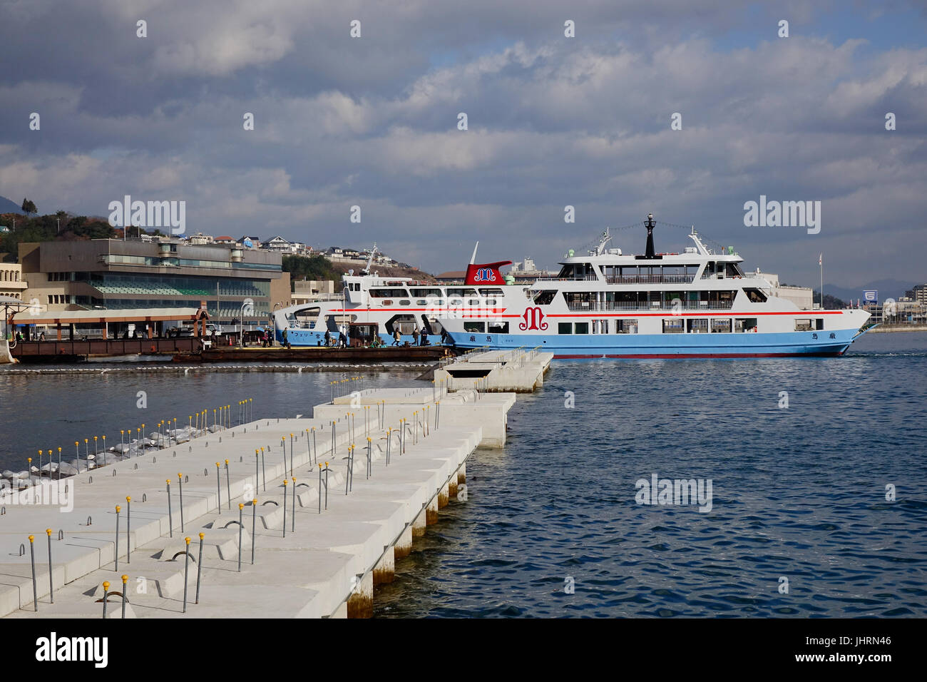 Hiroshima, Japan - Dec 28, 2015. Tourist boat at pier to Miyajima ...