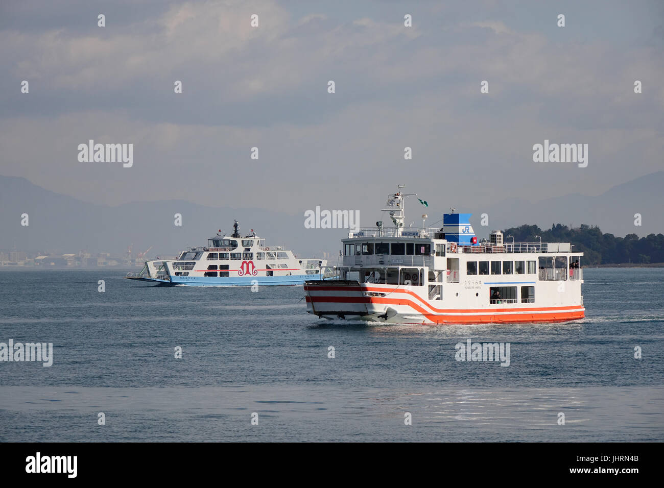 Hiroshima, Japan - Dec 28, 2015. Ferries running on the sea to Miyajima ...