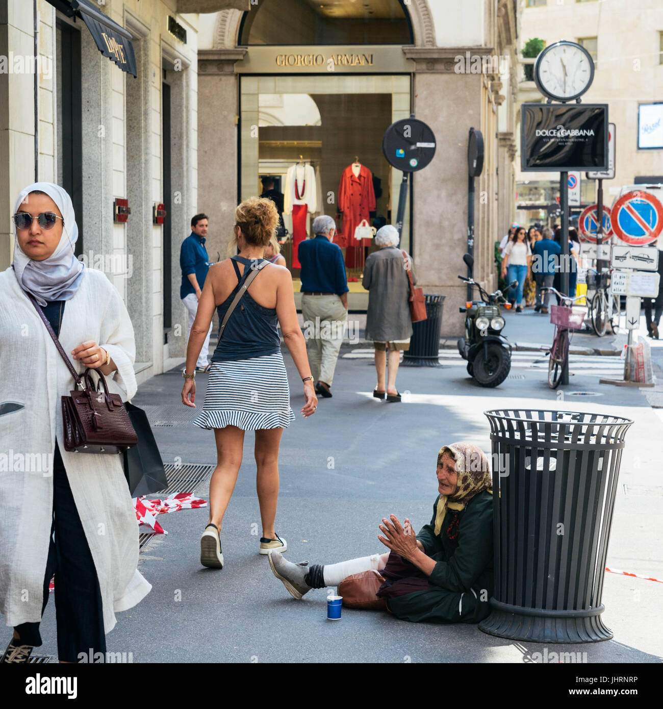 Shoppers on Via Montenapoleone, one of Milan's high-end shopping ...