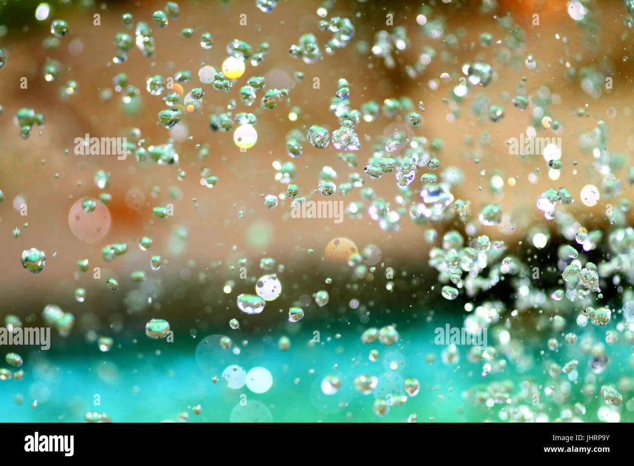 Fountain water splashing. Abstract colorful background with water ...