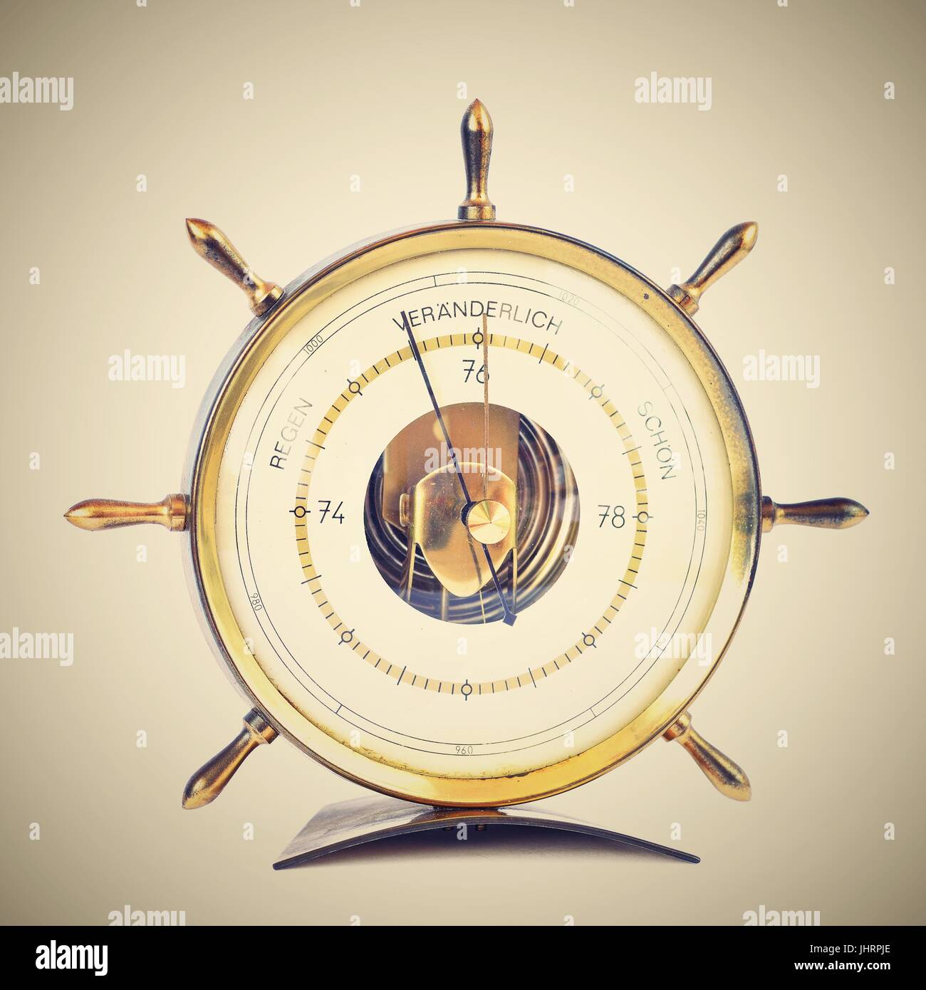 Beautiful old barometer. The shape of the rudder. Isolated on a clean ...