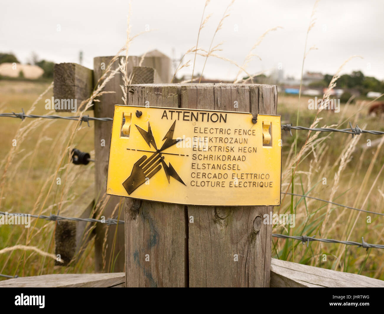A Safety Sign on Farm Electric Fence; Essex; UK Stock Photo - Alamy