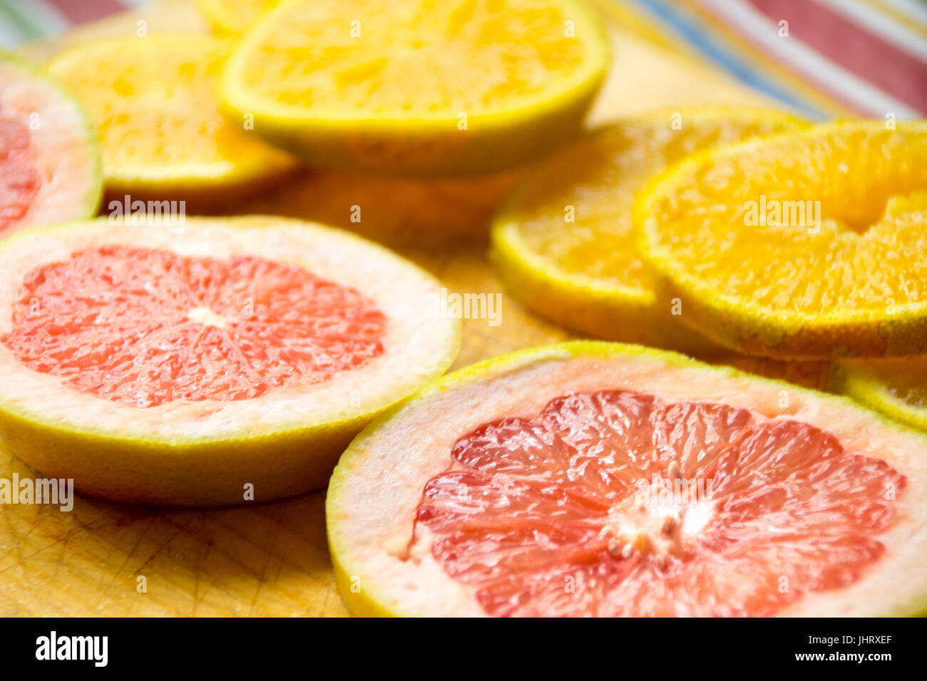 Photograph of some grapefruit and orange slices Stock Photo - Alamy