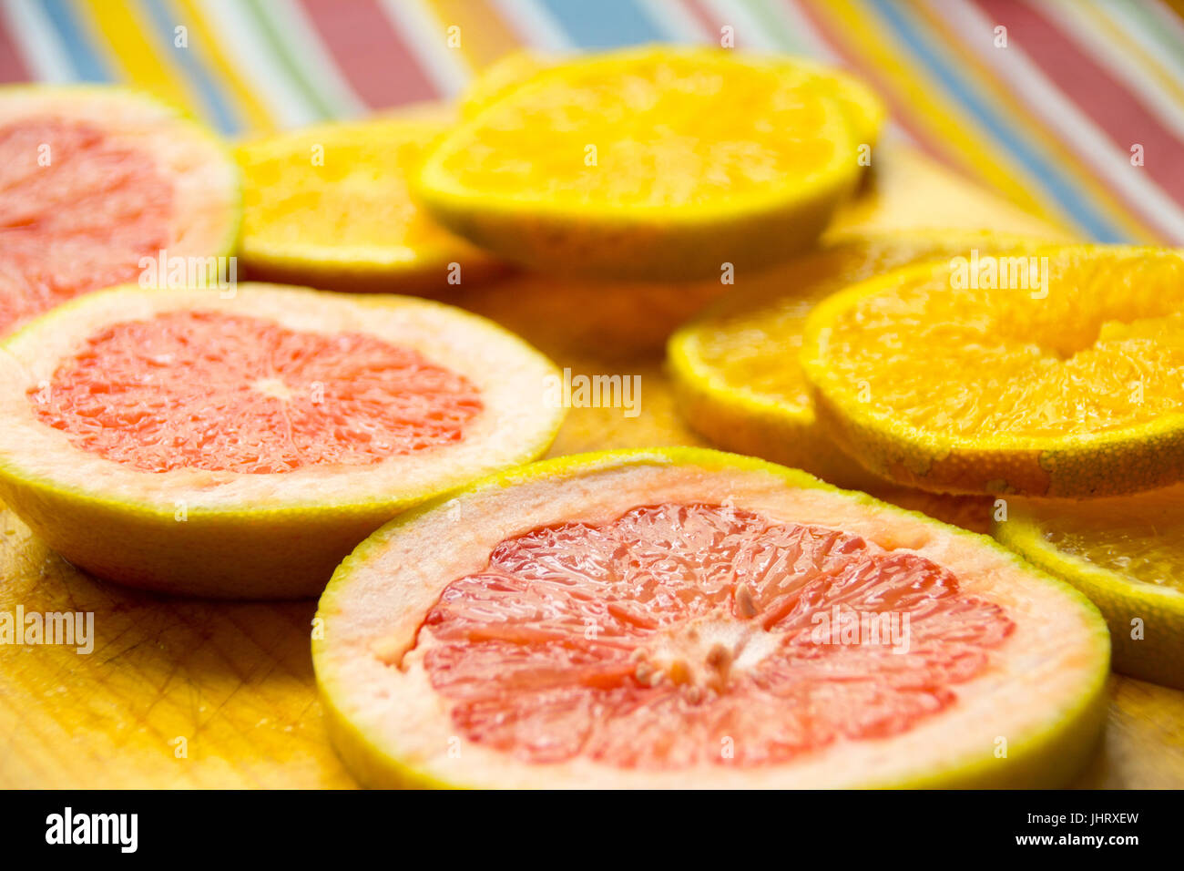 Photograph of some grapefruit and orange slices Stock Photo - Alamy