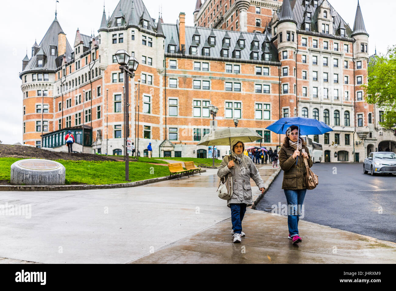 Two women walking town square hi-res stock photography and images - Alamy