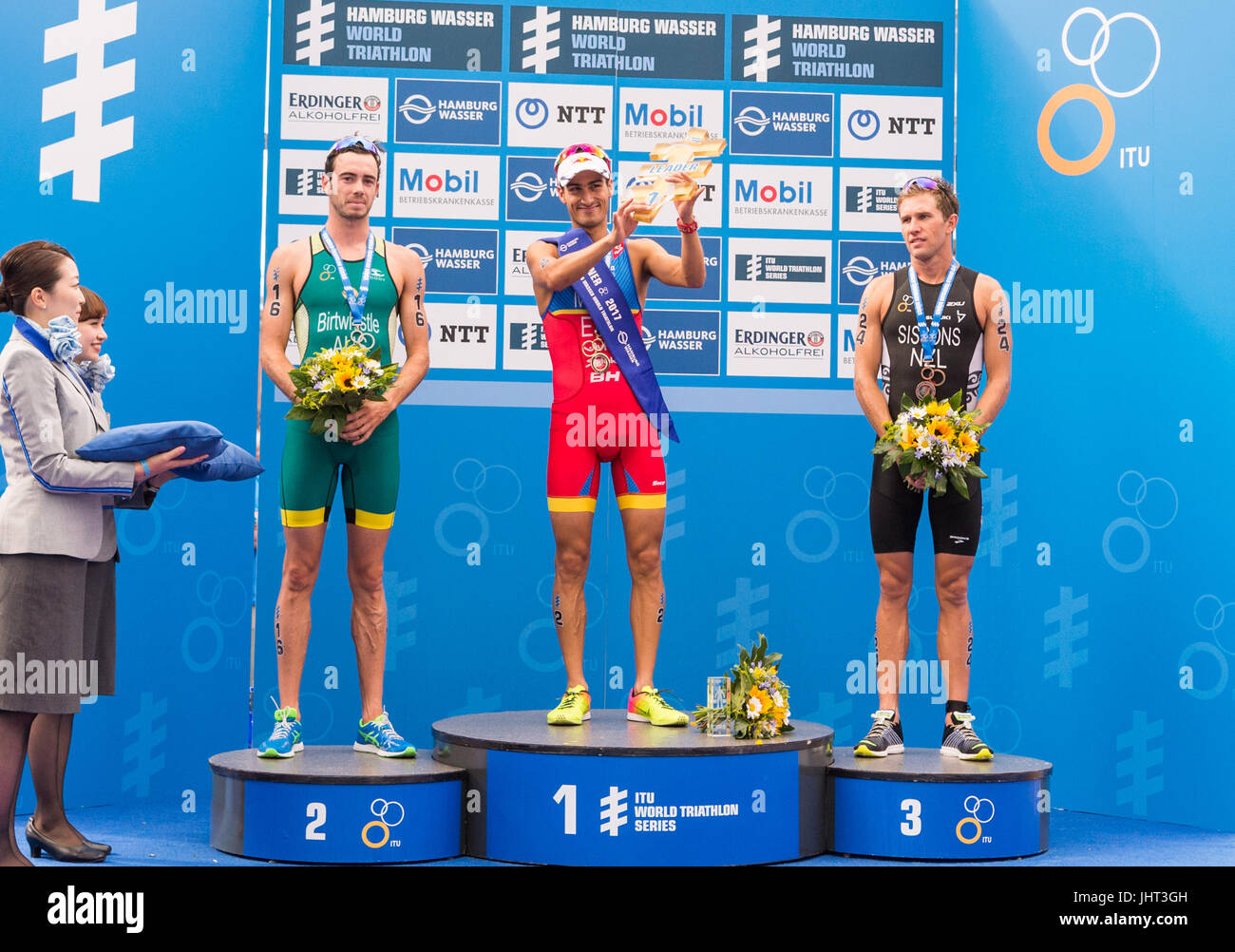Hamburg, Germany. 15th July, 2017. Triathletes Mario Mola (c, Spain ...