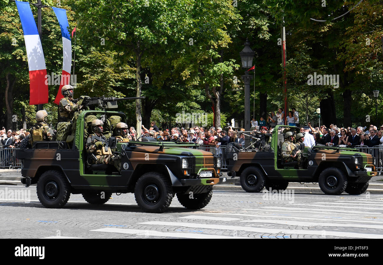 A Bastille Day military parade takes over the streets of Paris, France ...