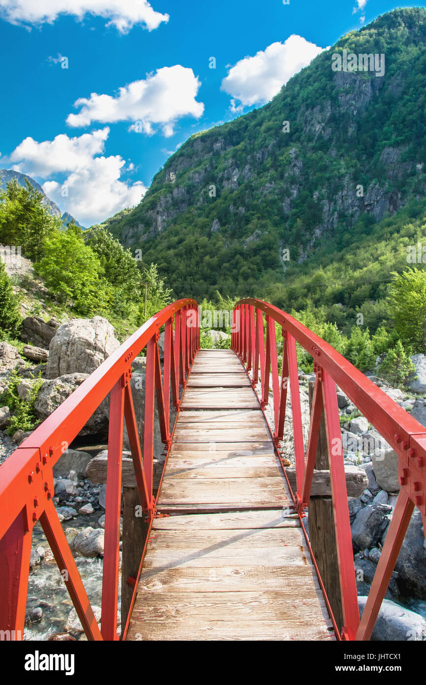 Red bridge in the mountain Stock Photo - Alamy