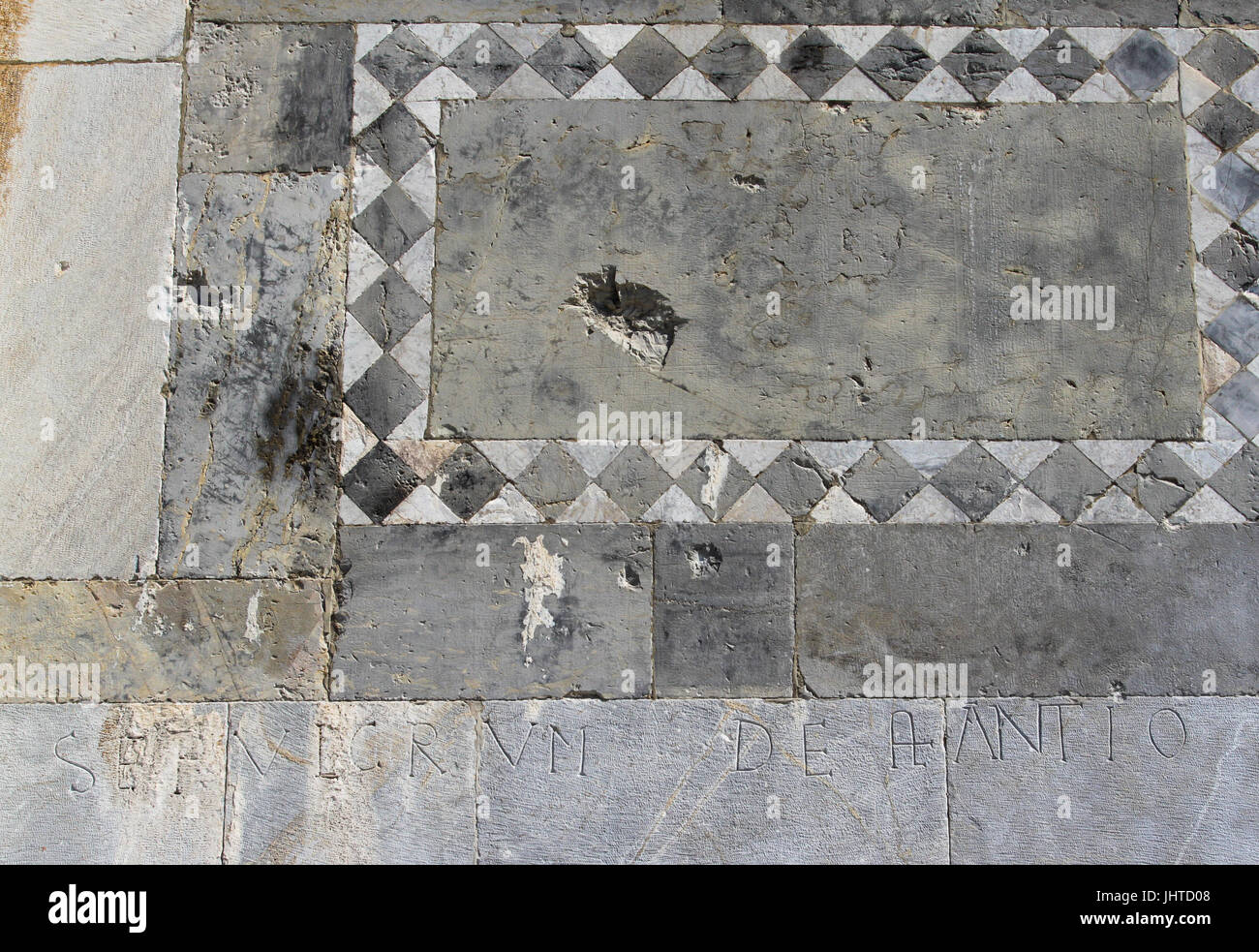 Ancient graffiti on side wall of cathedral in Pisa, Italy Stock Photo ...