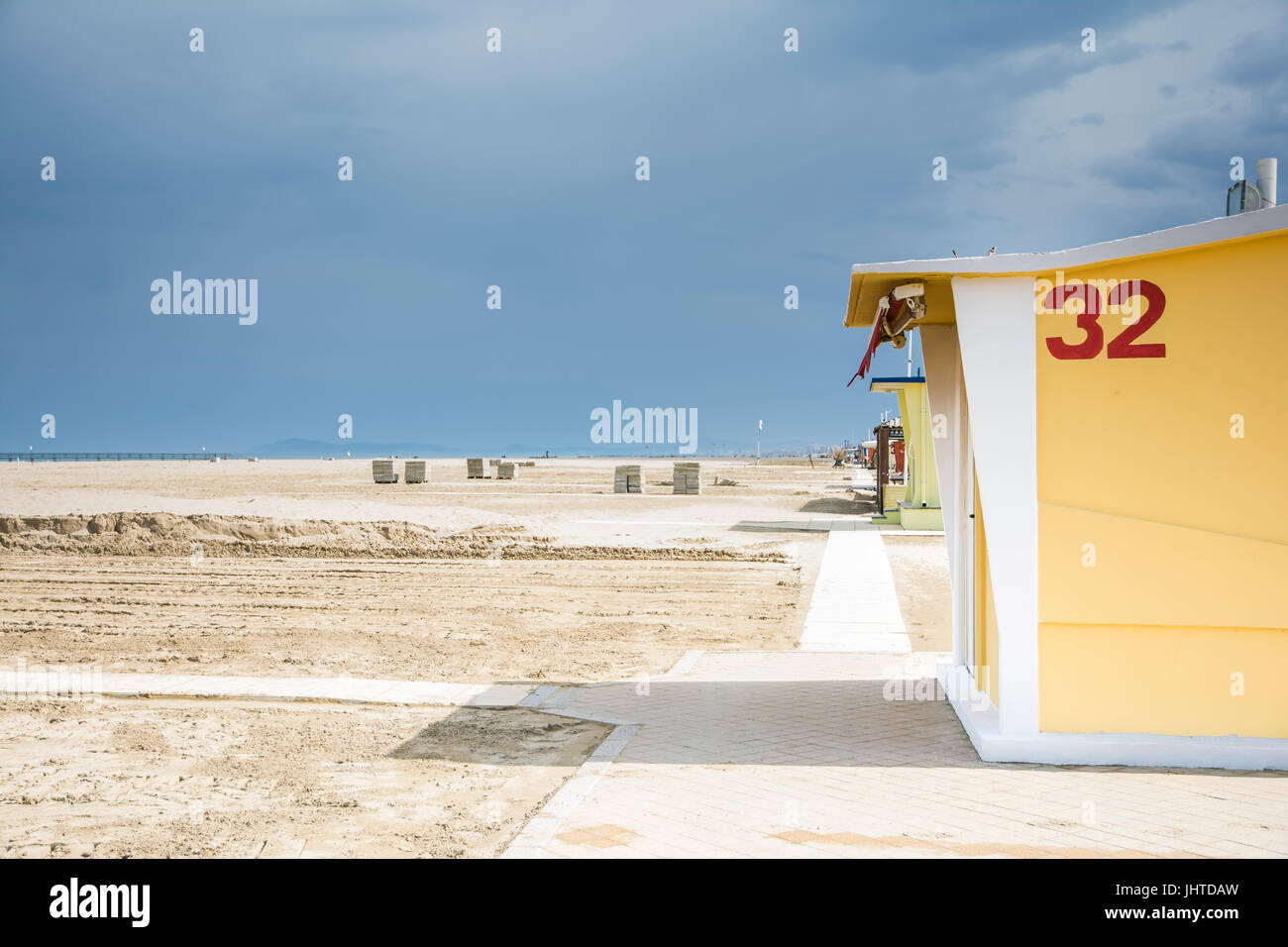 Rimini,Italy-April 17,2015:white fence and yellow bar on the beach in ...