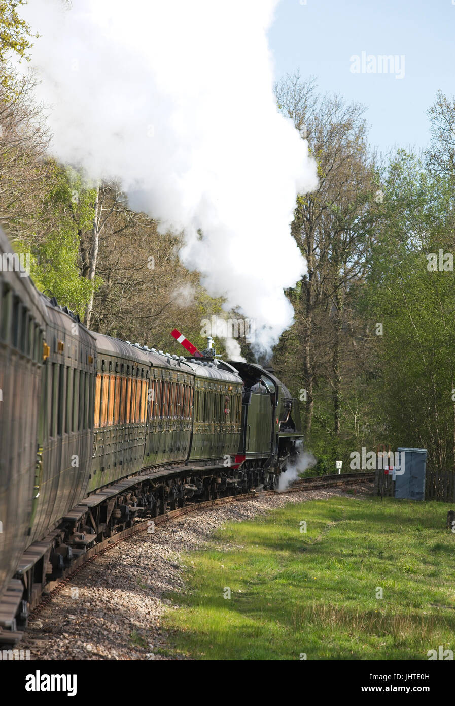 Steam locomotive pulling a passenger train, West Sussex, England, UK ...