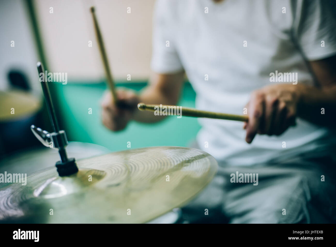 Man playing drums in garage hi-res stock photography and images - Alamy