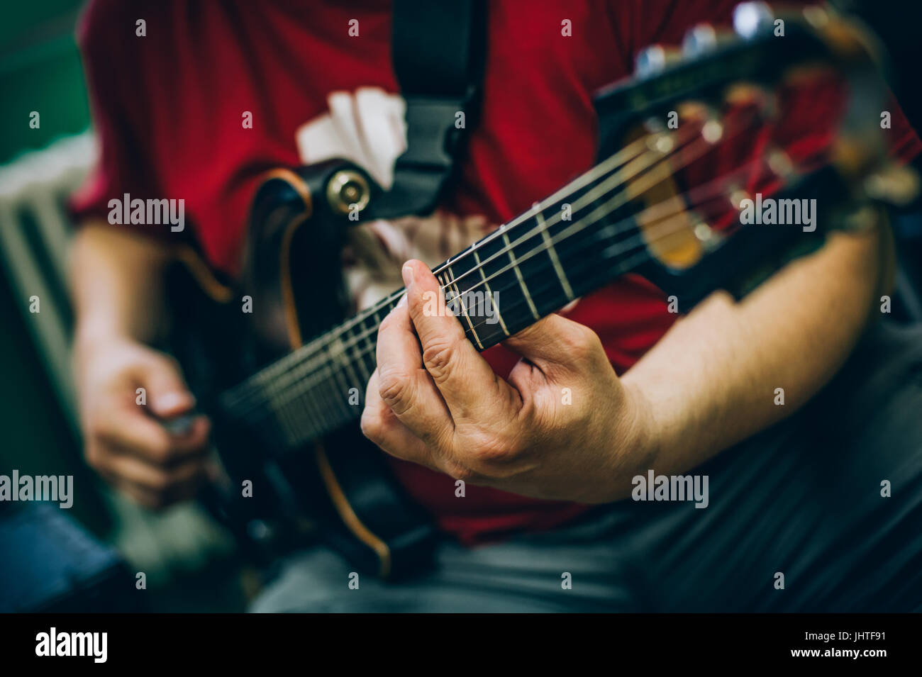 Behind the scene. Male guitarist artist musician practice playing ...
