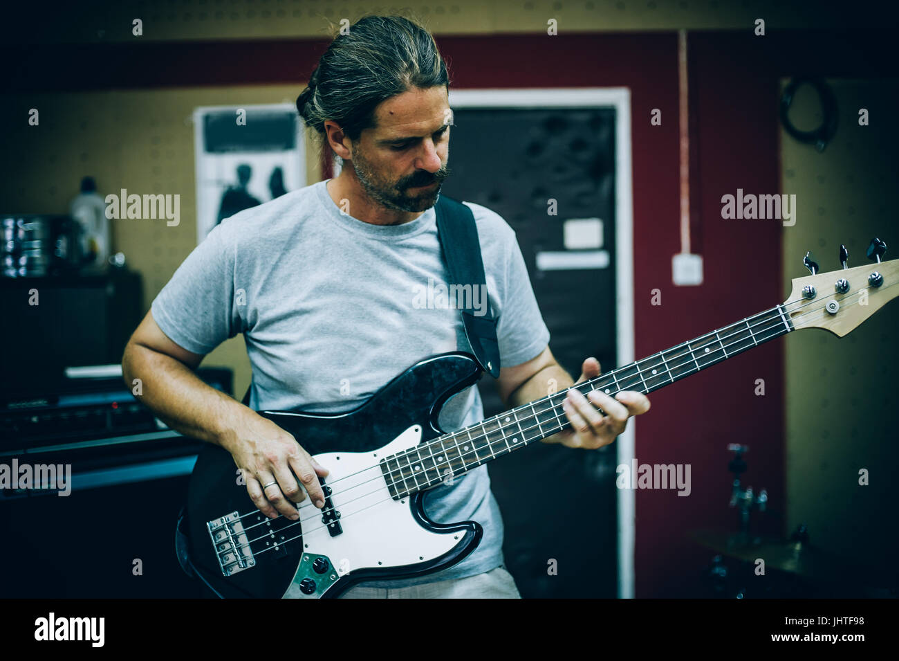 Behind the scene. Male guitarist artist musician practice playing ...