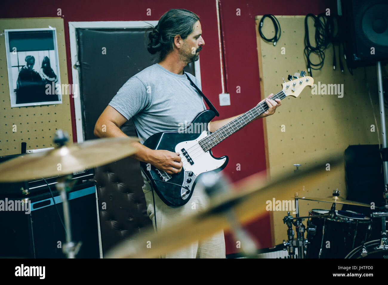 Behind the scene. Male guitarist artist musician practice playing ...