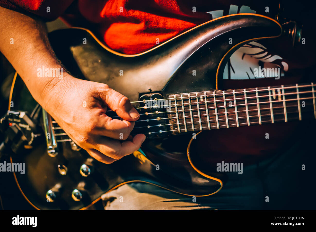Behind the scene. Male guitarist artist musician practice playing ...
