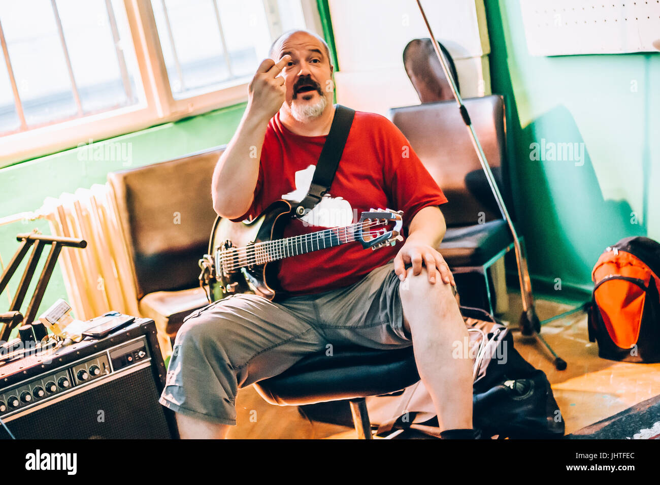 Behind the scene. Male guitarist artist musician practice playing ...