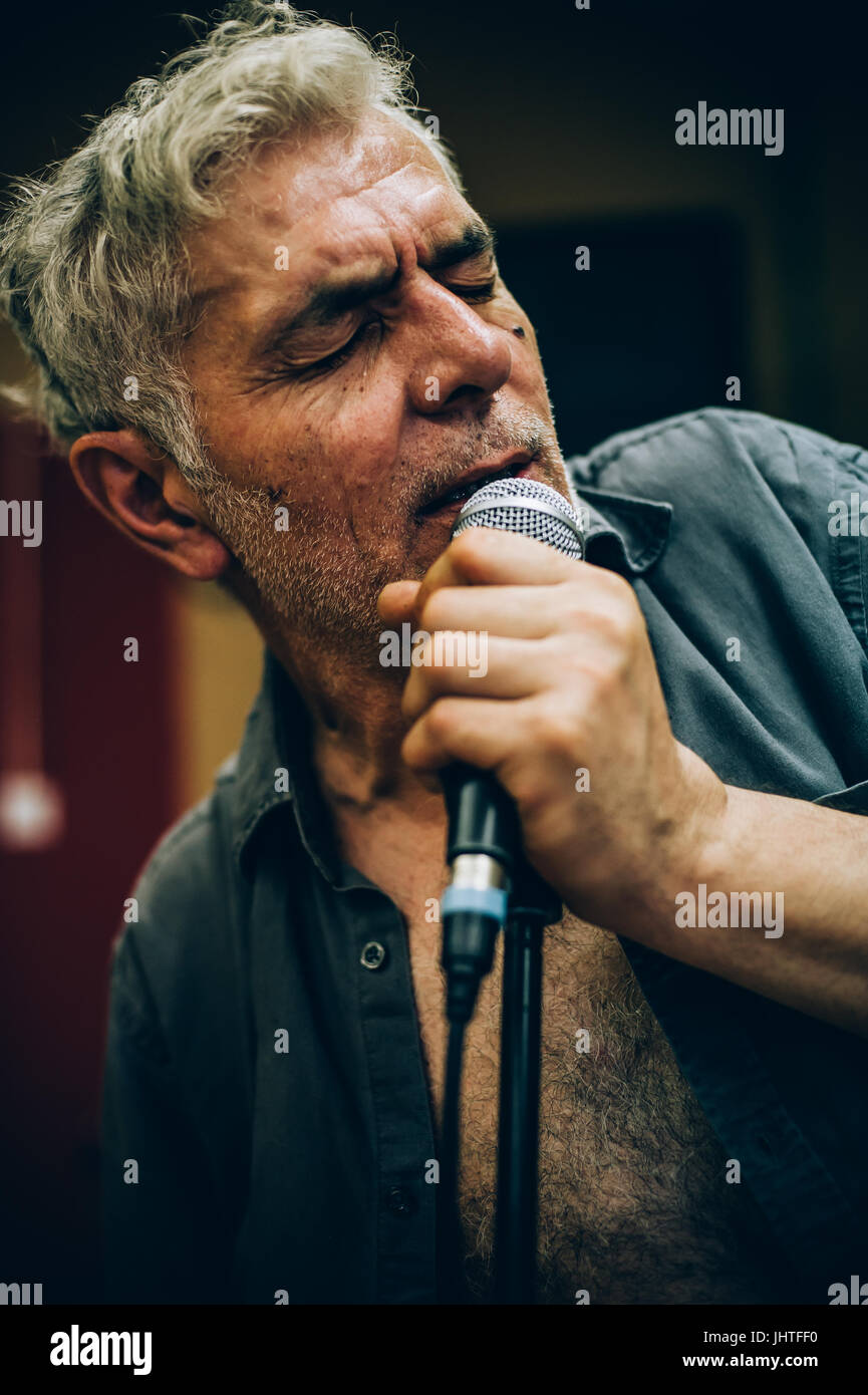 Man behind microphone in studio hi-res stock photography and images - Alamy