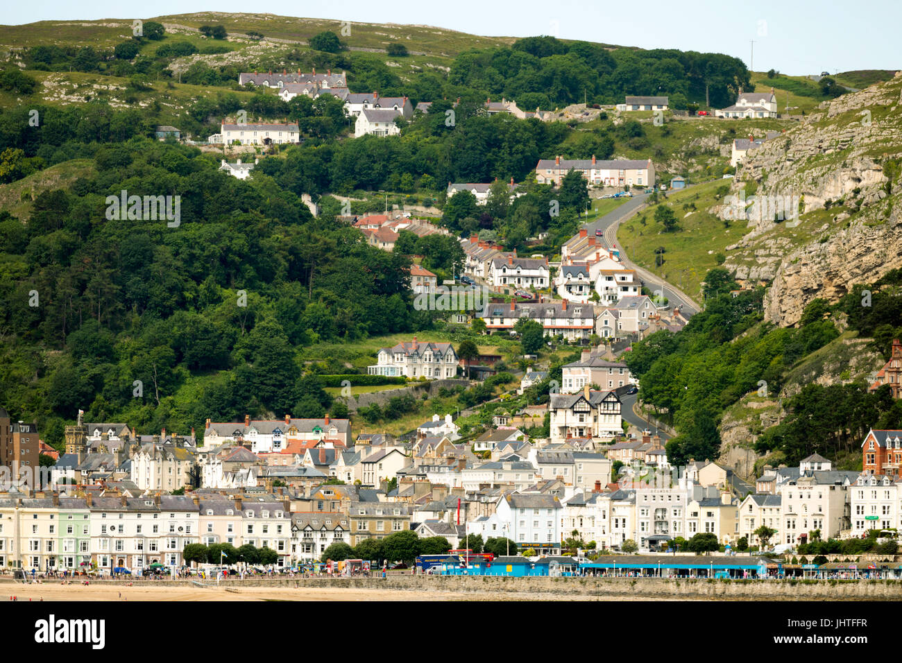 The coastal town of Llandudno and its promenade on a summers day with ...