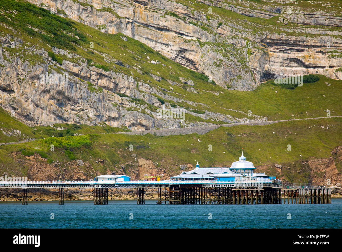 A summers day over both the Great Orme limestone rock formation and the ...