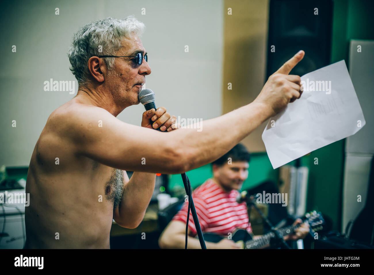 Behind the scene. Rock band practice in the messy recording music ...