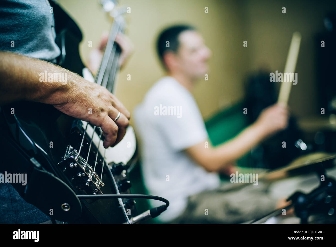 Behind the scene. Rock band practice in the messy recording music ...